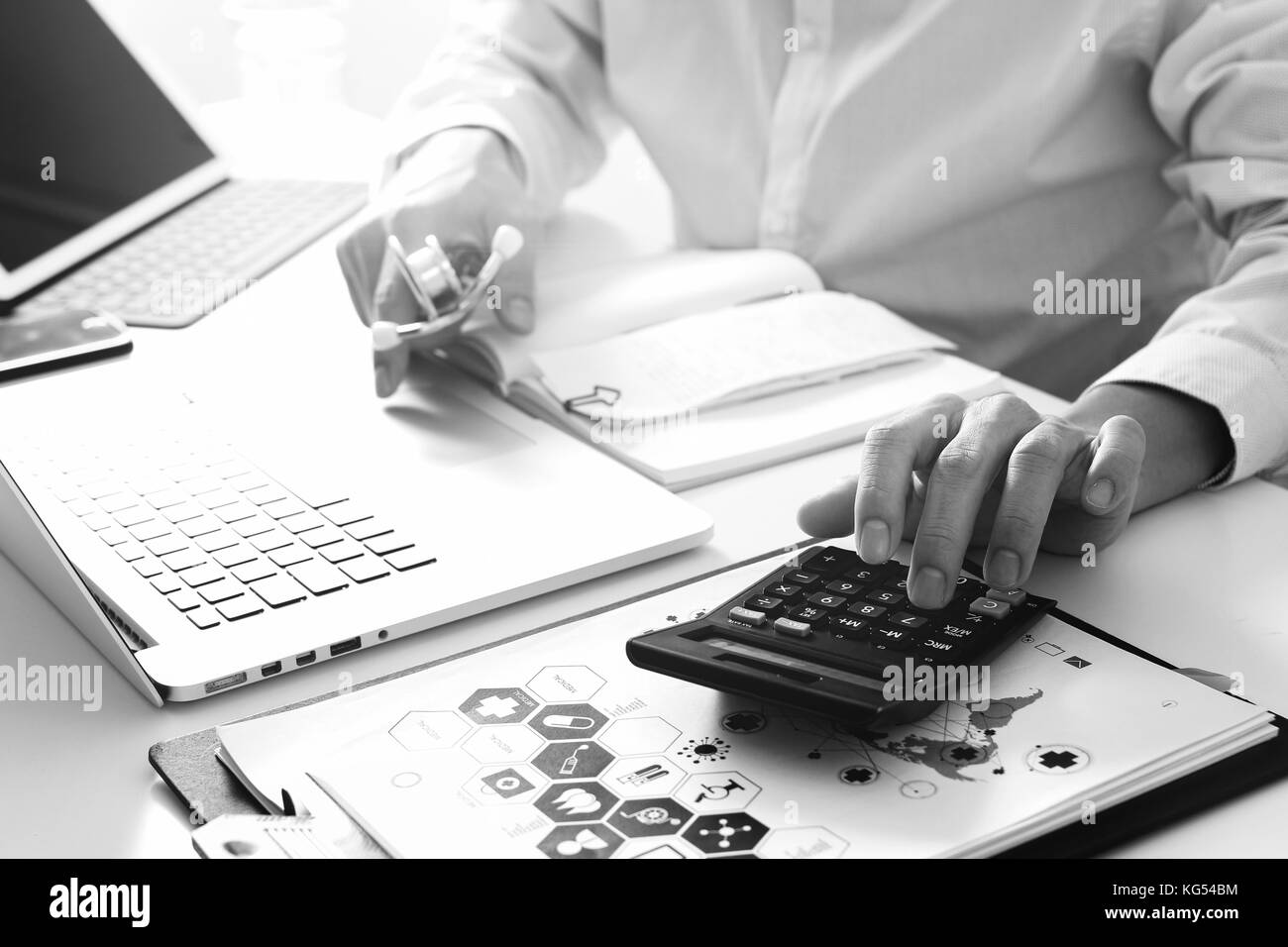 Healthcare costs and fees concept.Hand of smart doctor used a ...