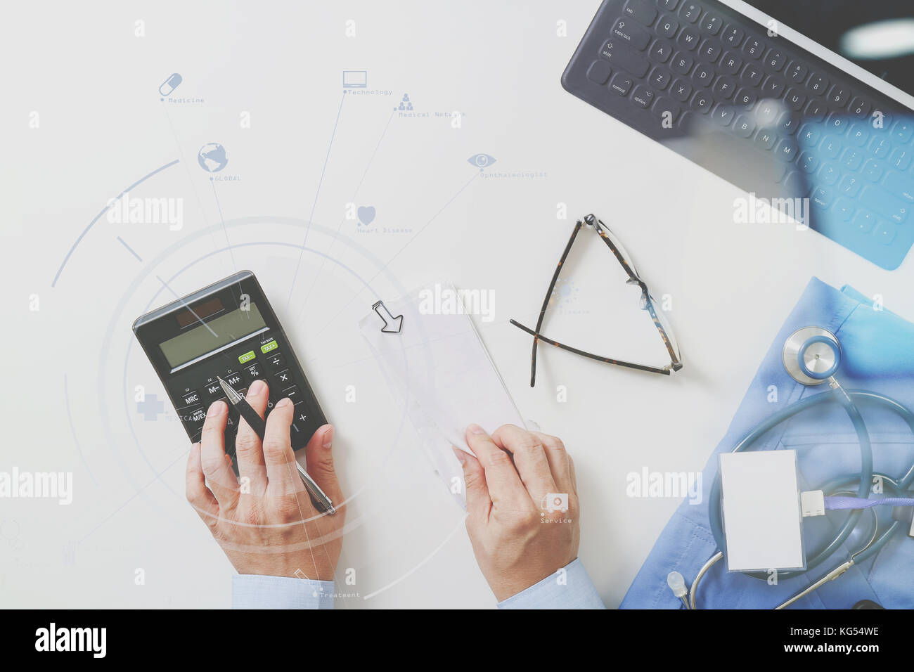top view of Healthcare costs and fees concept.Hand of smart doctor used ...