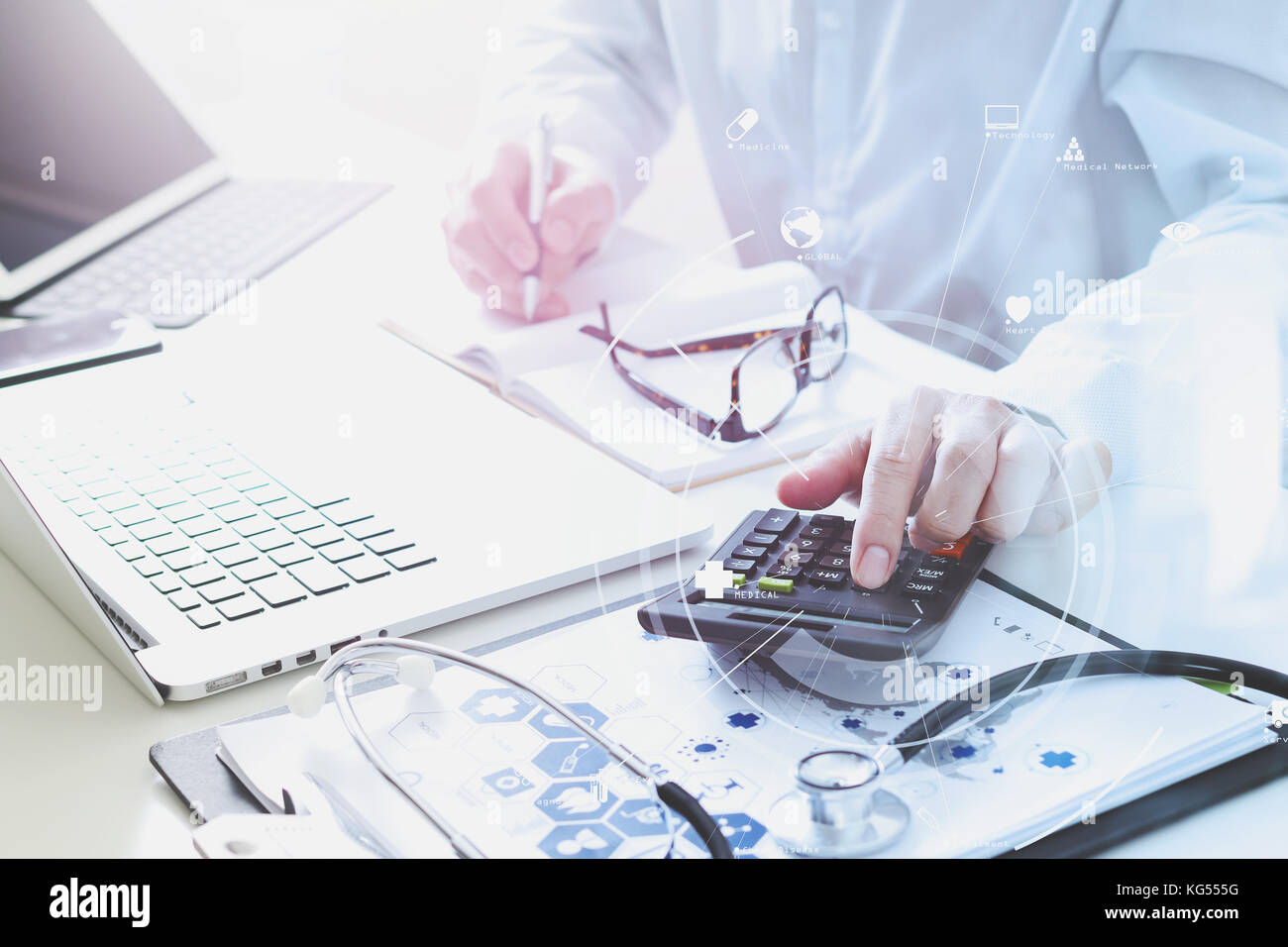 Healthcare costs and fees concept.Hand of smart doctor used a ...