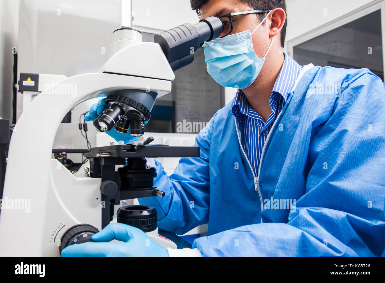 Looking Through Microscope Stock Photos & Looking Through Microscope ...