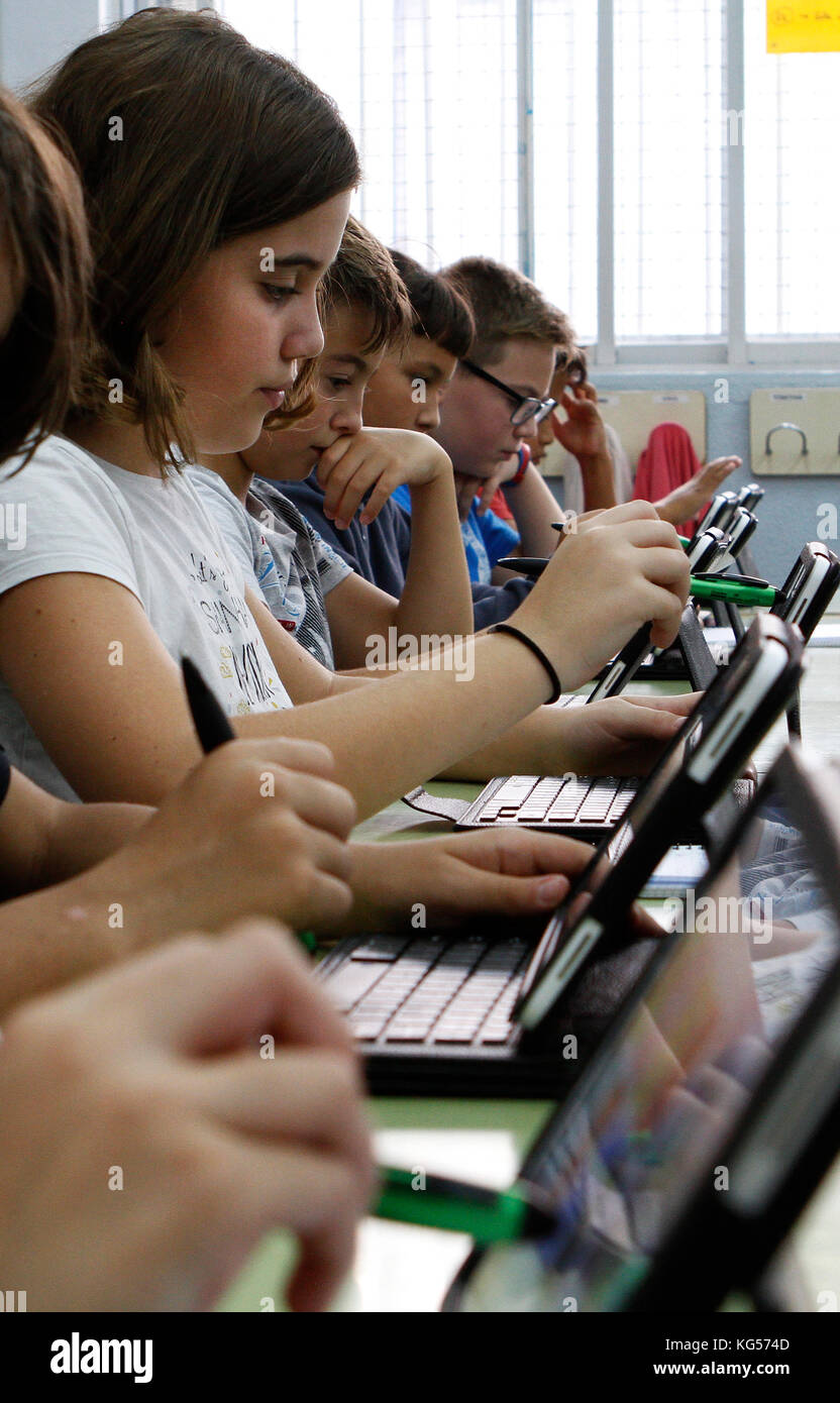 Students of elementary school learning the dangers and the good uses of ...