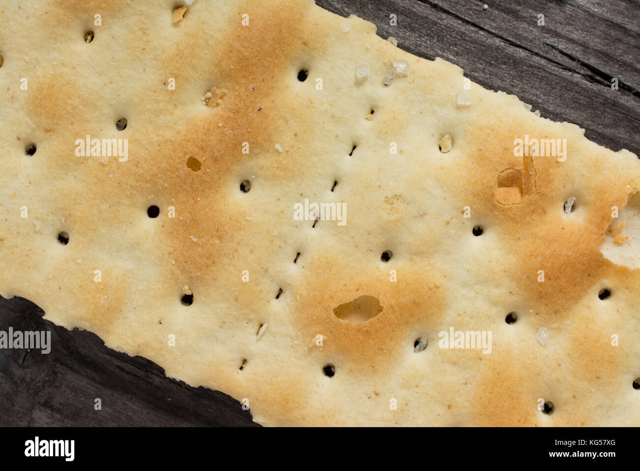 Texture of a cracker as background Stock Photo - Alamy
