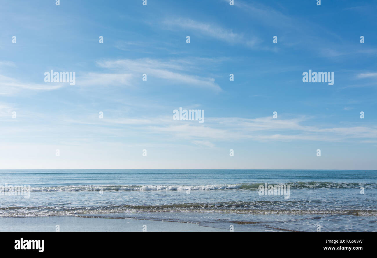 waves, sea and sun reflecting from the beach - background Stock Photo ...