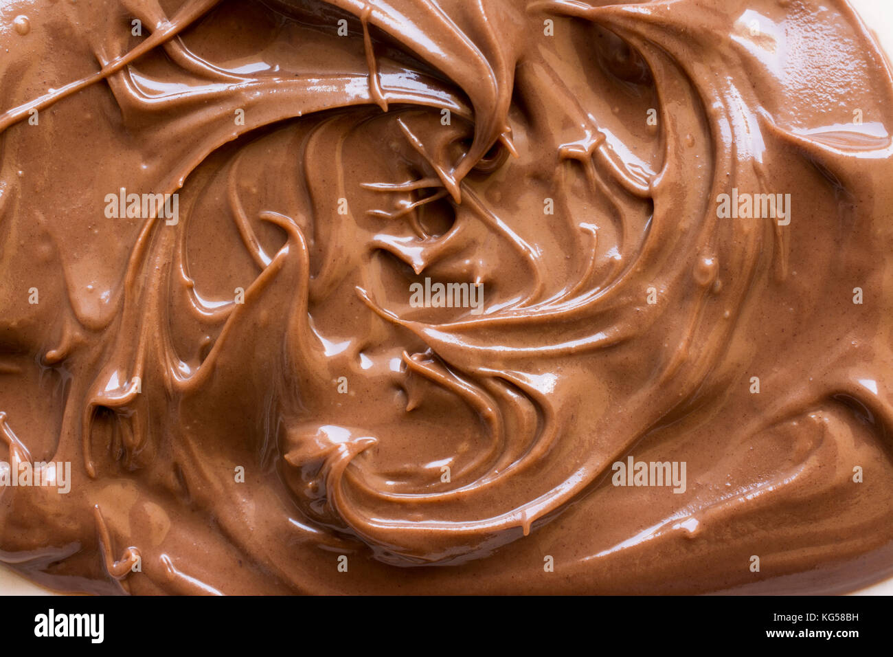 chocolate hazelnut spread on plate. Close up and background Stock Photo ...