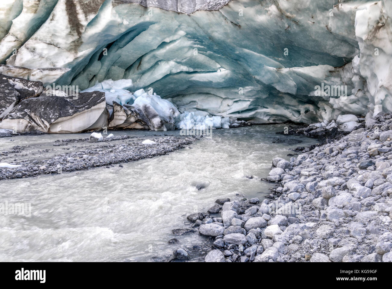 A colorful view of the ice cave in the glacier and the source of the ...