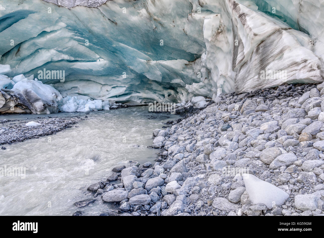 A colorful view of the ice cave in the glacier and the source of the ...