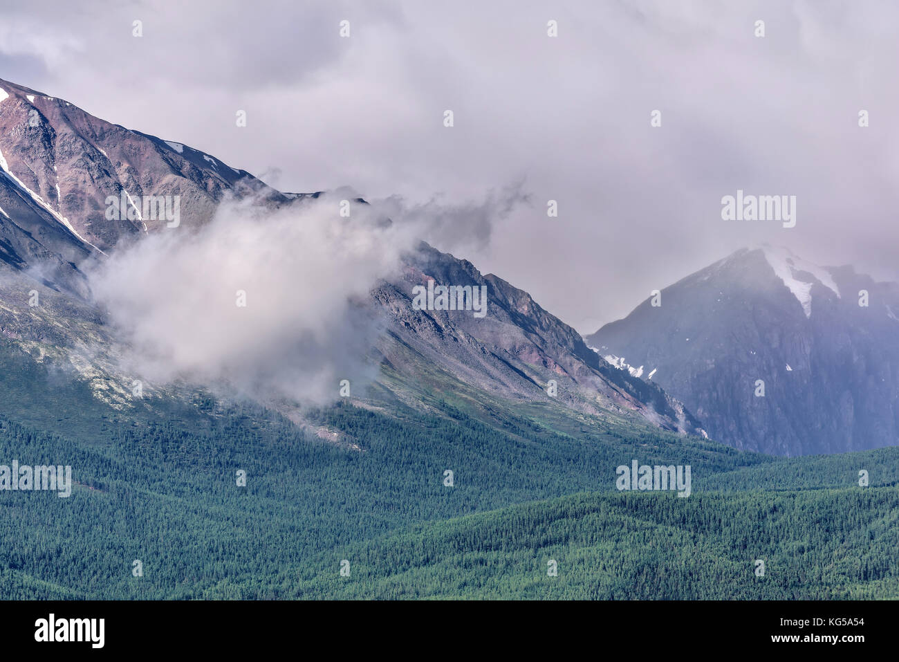 Fluffy clouds in the mountains hi-res stock photography and images - Alamy
