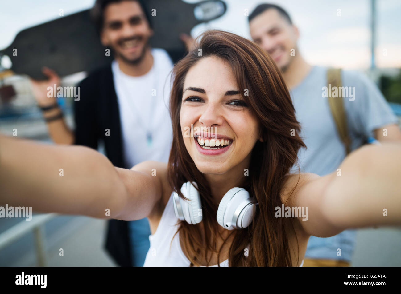 Group of happy friends hang out together Stock Photo - Alamy