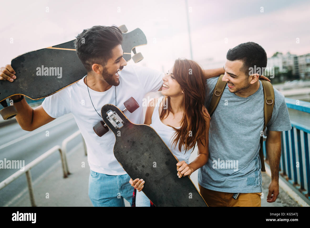 Group of happy friends hang out together Stock Photo - Alamy
