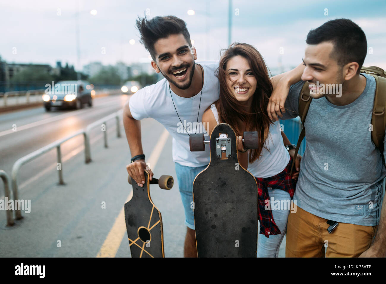 Group of happy friends hang out together Stock Photo - Alamy