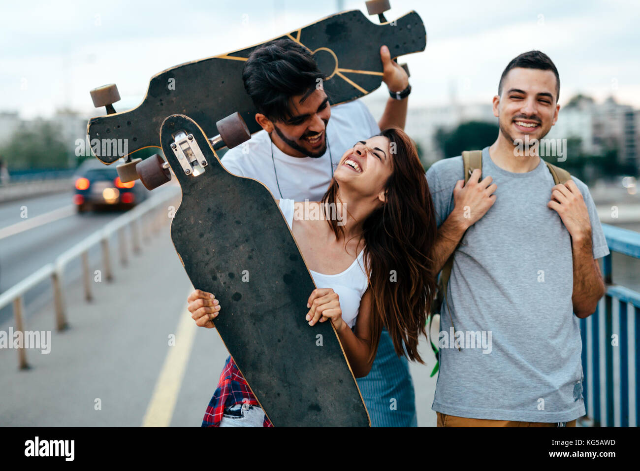 Group of happy friends hang out together Stock Photo - Alamy