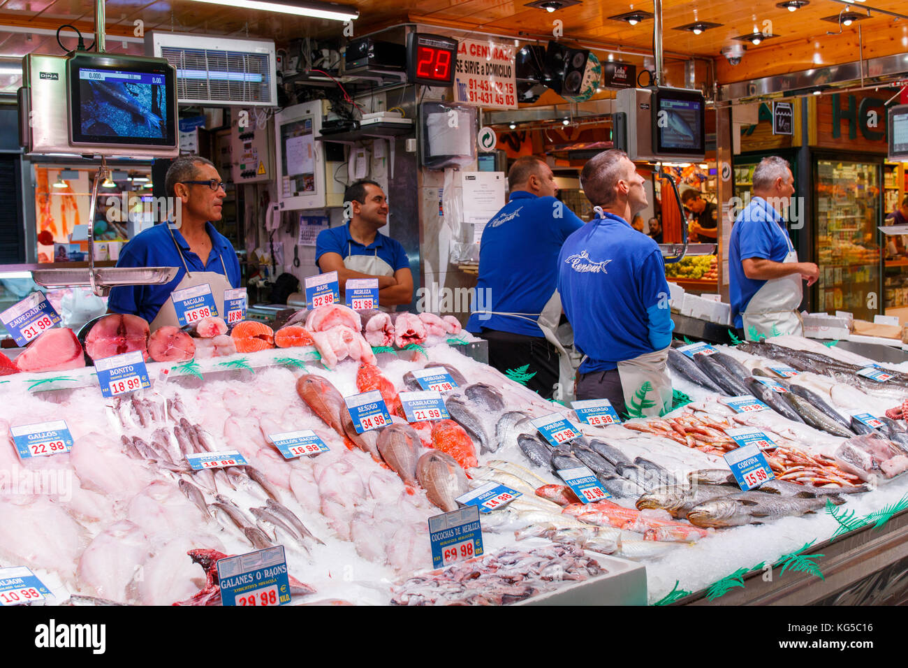 market workers performing their work one working day Stock Photo - Alamy