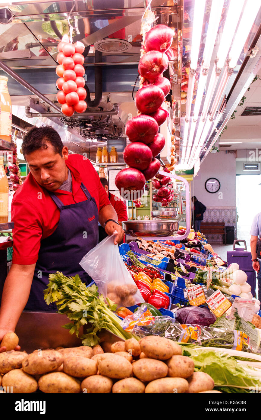 market workers performing their work one working day Stock Photo - Alamy