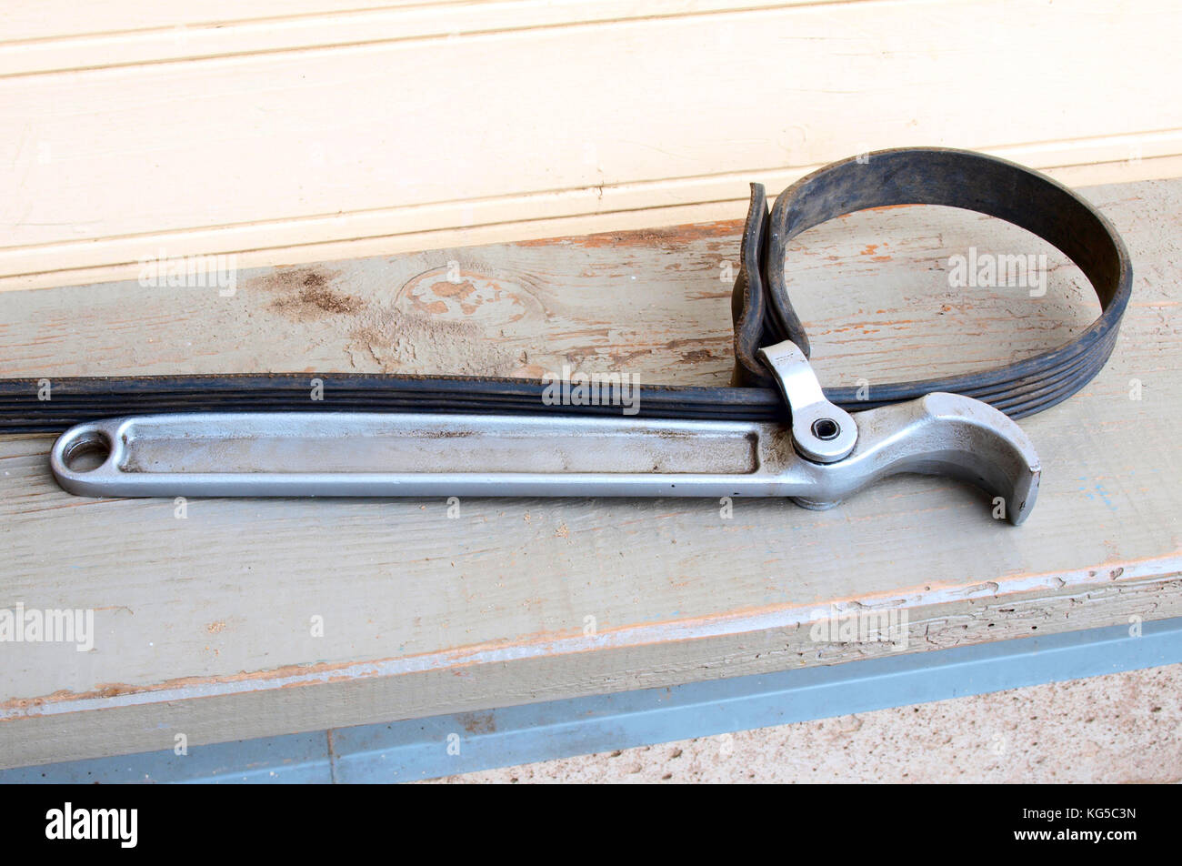 Special mechanic tool strap wrench for big nuts Stock Photo - Alamy