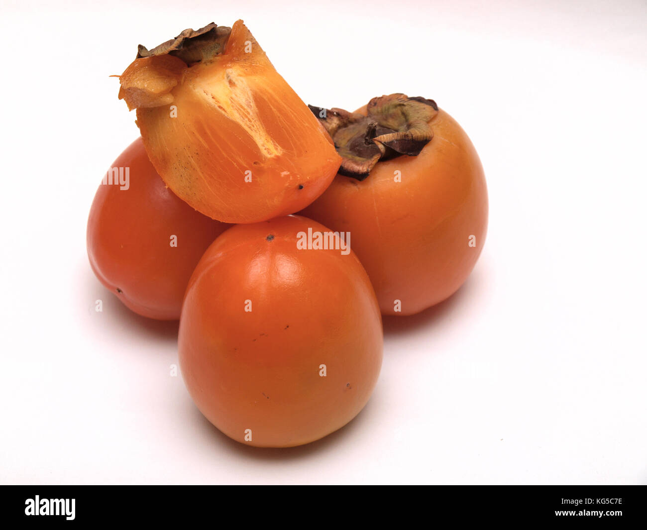 Ripe tropical fruits persimmon or hurma close up Stock Photo - Alamy