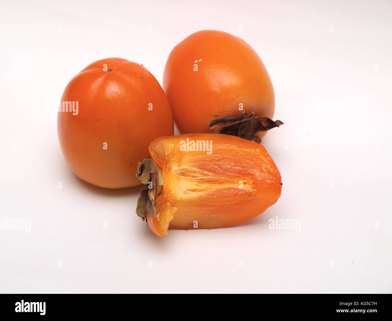 Ripe tropical fruits persimmon or hurma close up Stock Photo - Alamy