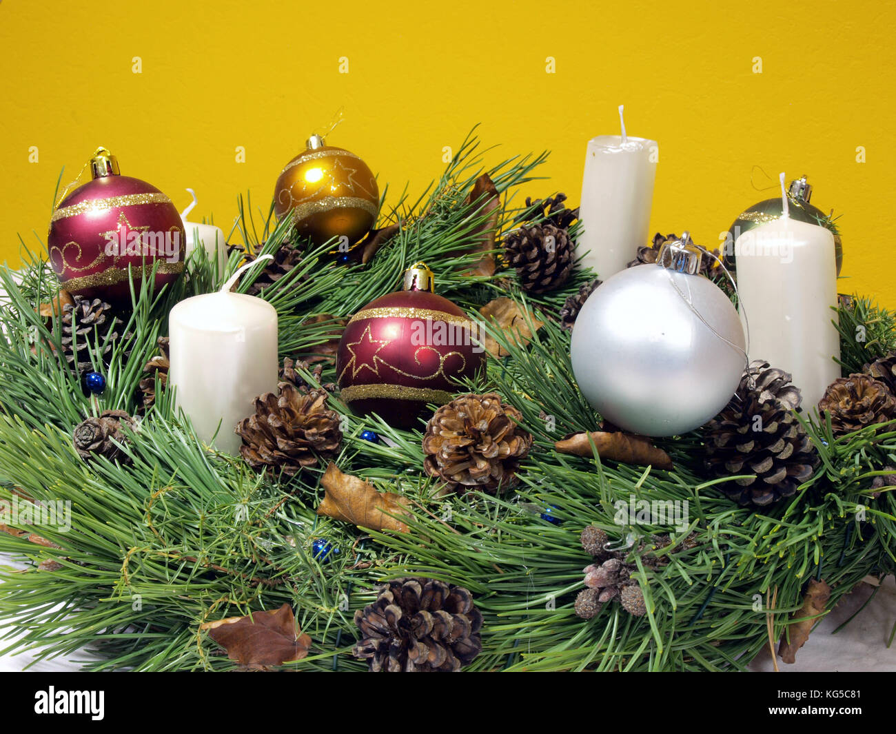 Advent wreath decorated with color Christmas tree balls Stock Photo - Alamy