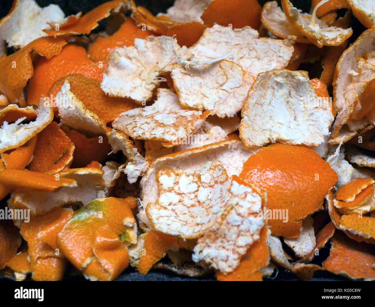 Pieces of dried tangerine peels close up Stock Photo - Alamy