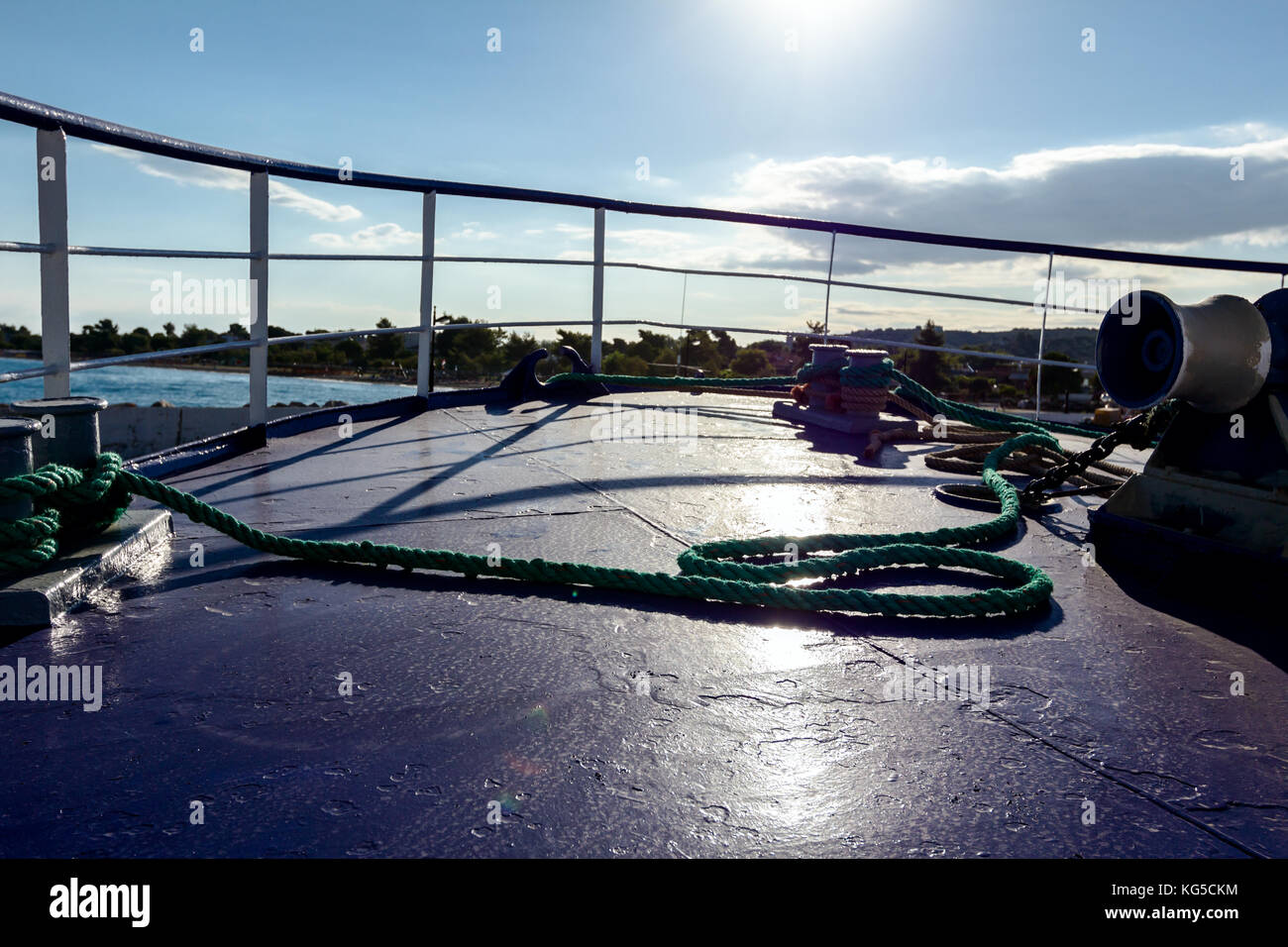 View of the fishing ship or ferry boat deck with back light from ...