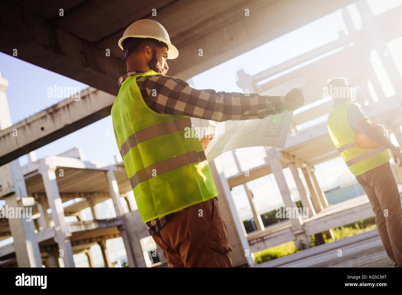 Picture of construction engineer working on building site Stock Photo ...