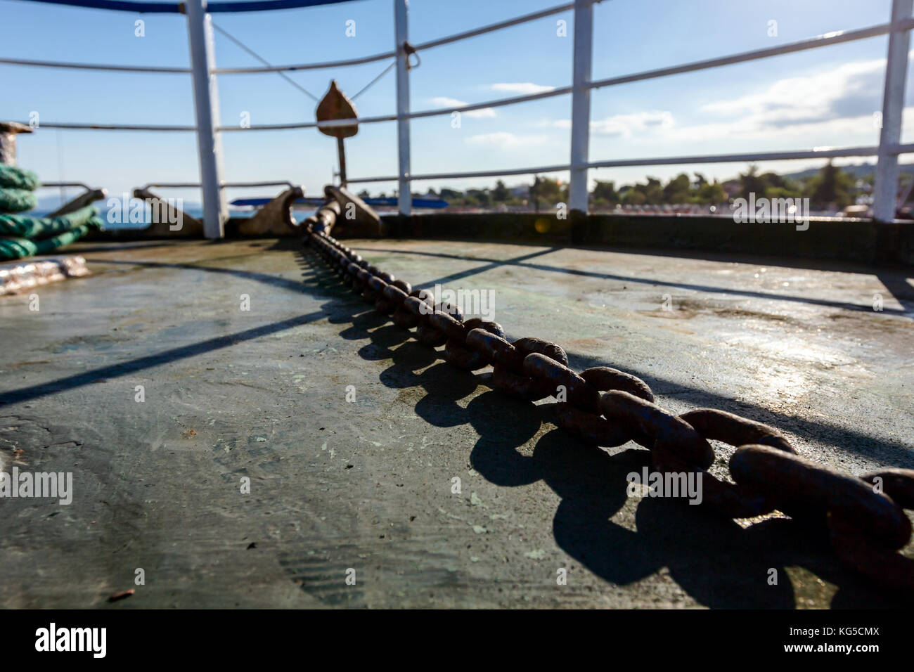 View of the fishing ship or ferry boat deck with back light with chain ...
