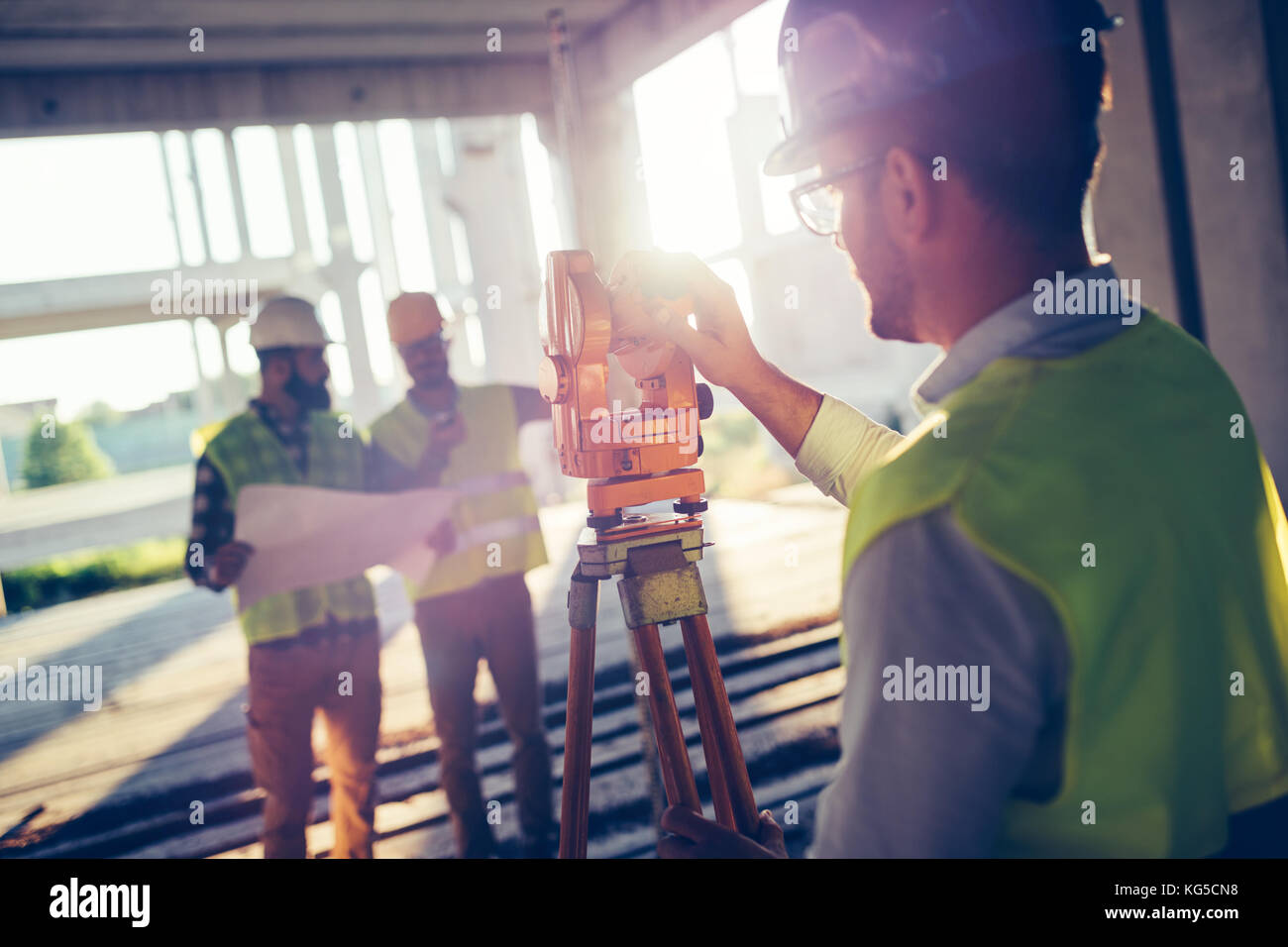 Portrait of construction engineers working on building site Stock Photo ...