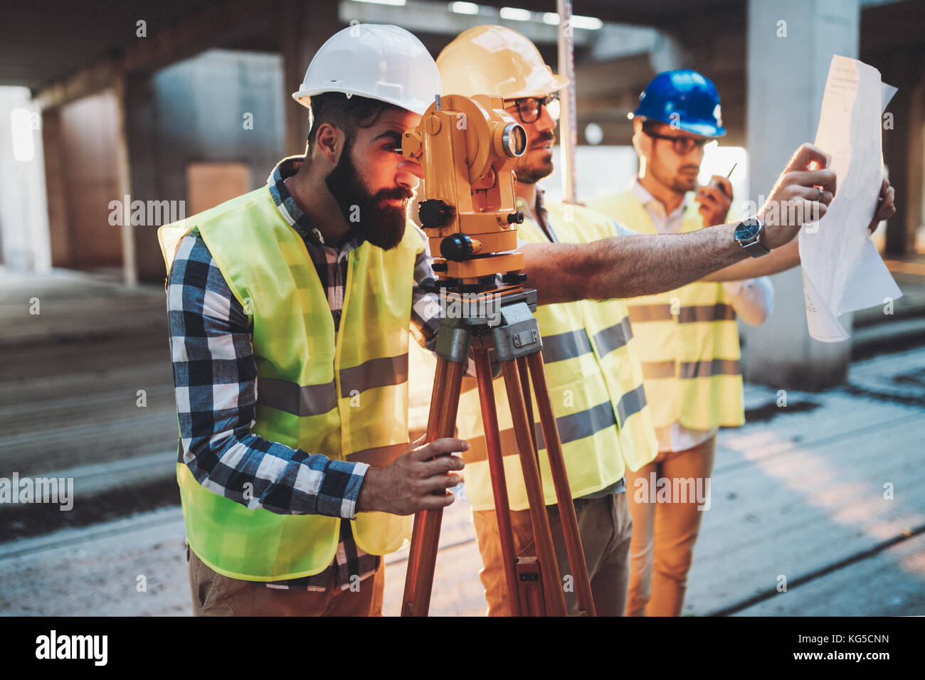 People working together build building hi-res stock photography and ...