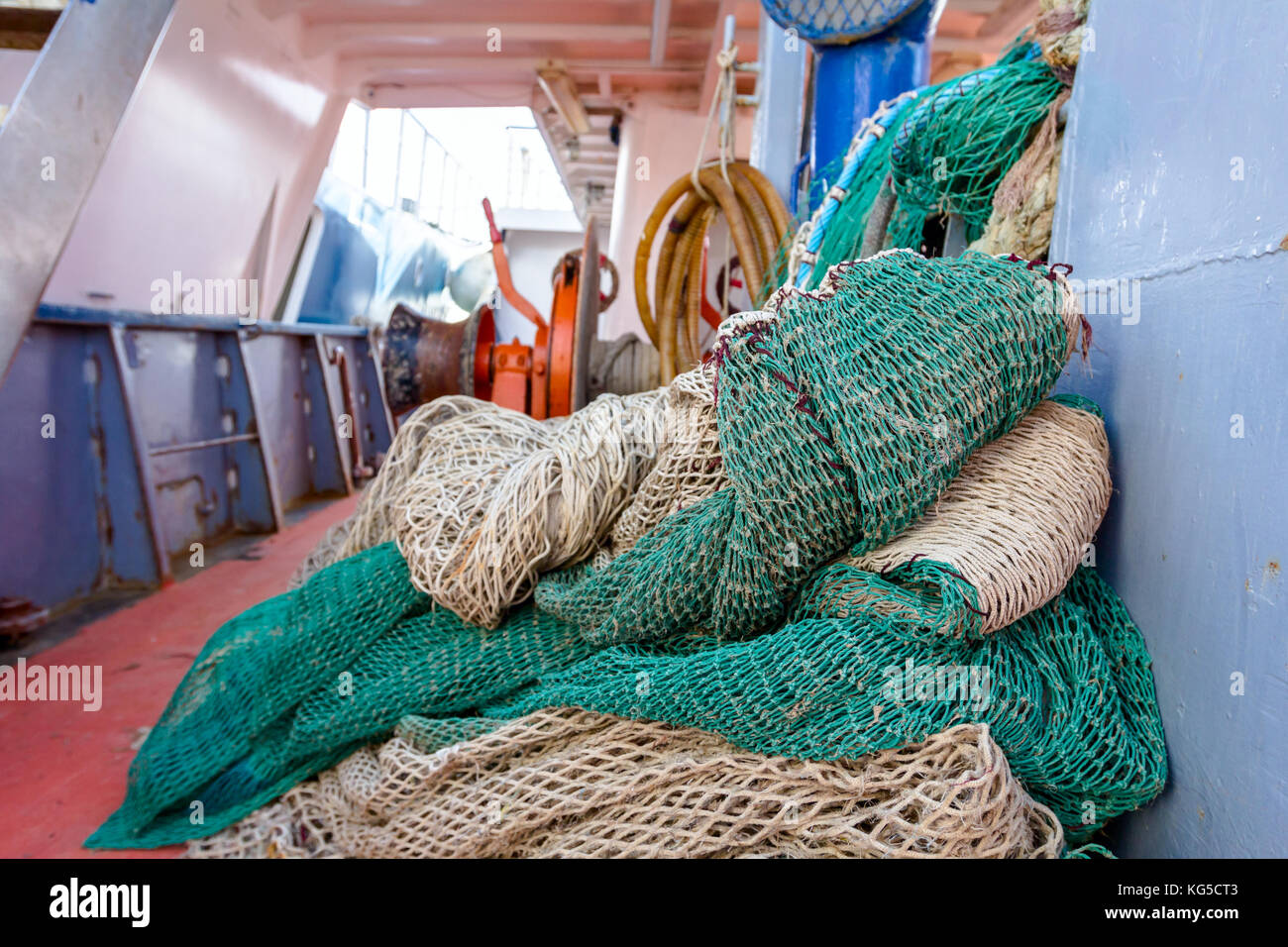 Heap of commercial fishing net and extraction mechanism is in ...