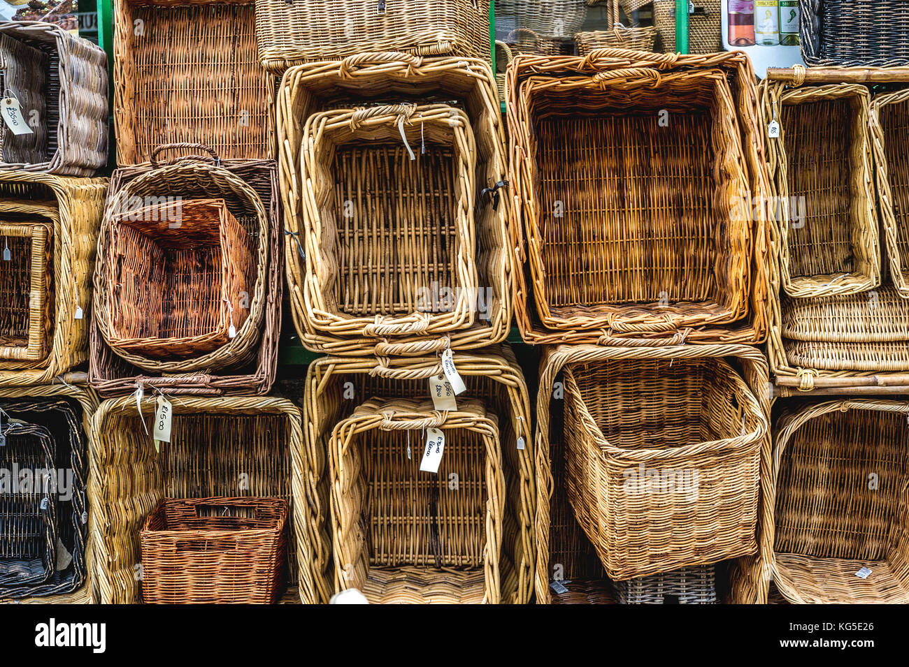 Rows of baskets on sale on a market stall in Blackpool, Lancashire, UK ...