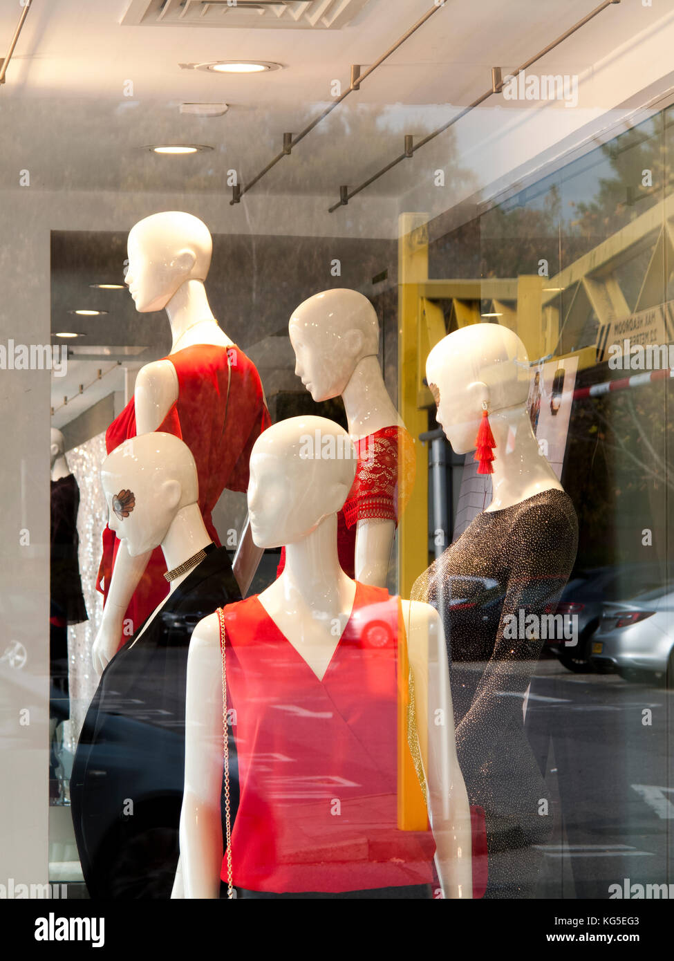 Manikin in Next shop window display, women and men high street fashion ...