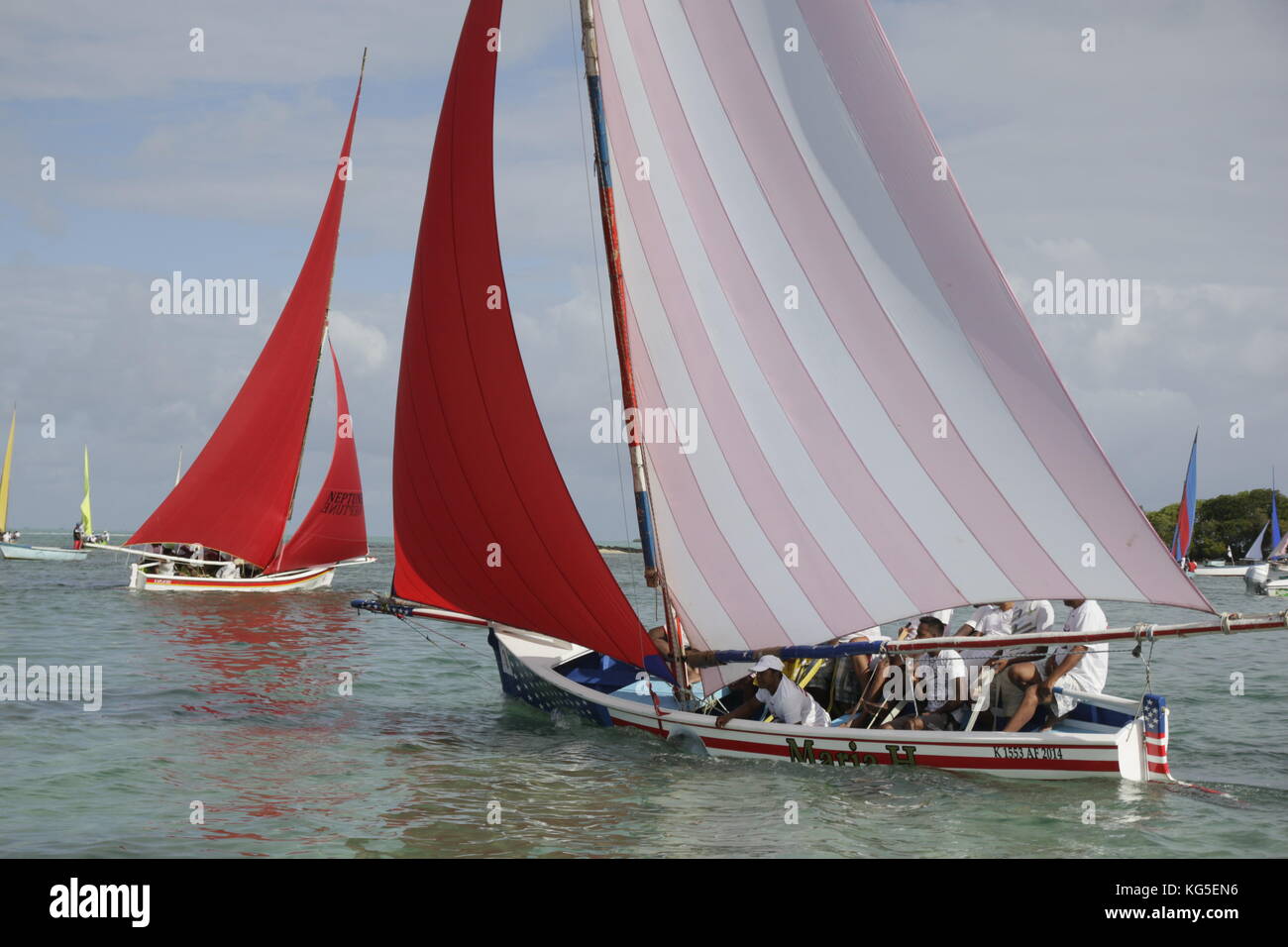 Regatta of colorful traditional Mauritian wooden Pirogues Mahebourg ...