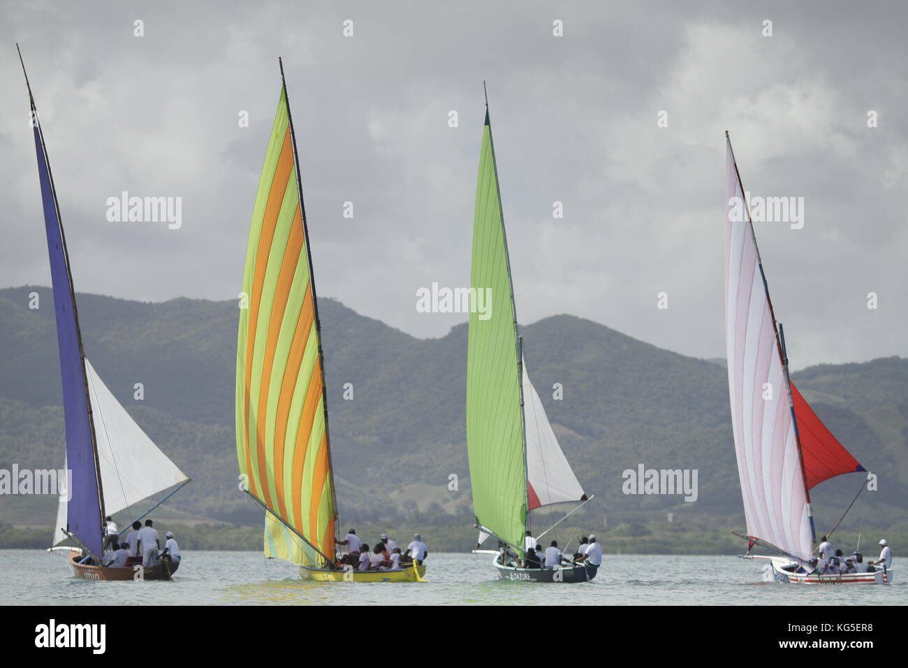 Regatta of colorful traditional Mauritian wooden Pirogues Mahebourg ...