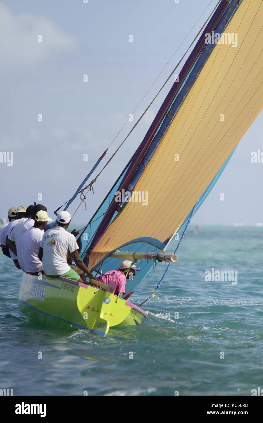 Regatta of colorful traditional Mauritian wooden Pirogues Mahebourg ...