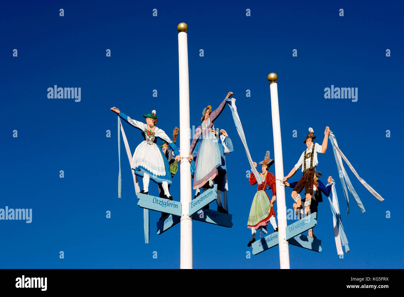 Okotberfest, small maypole with figures in different Bavarian ...