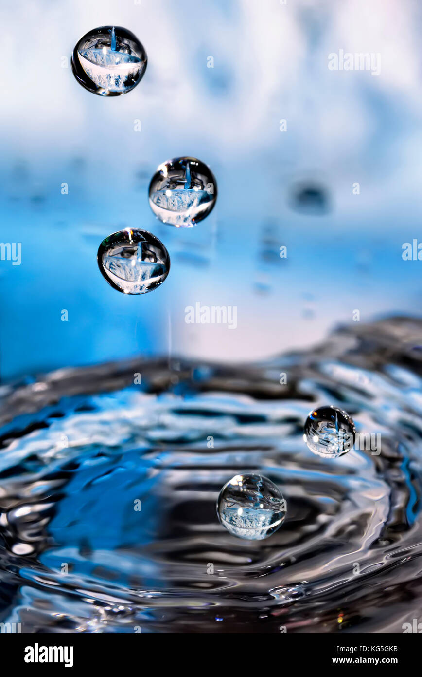 Splashed water drops. Fresh, blue water. Natural background Stock Photo ...