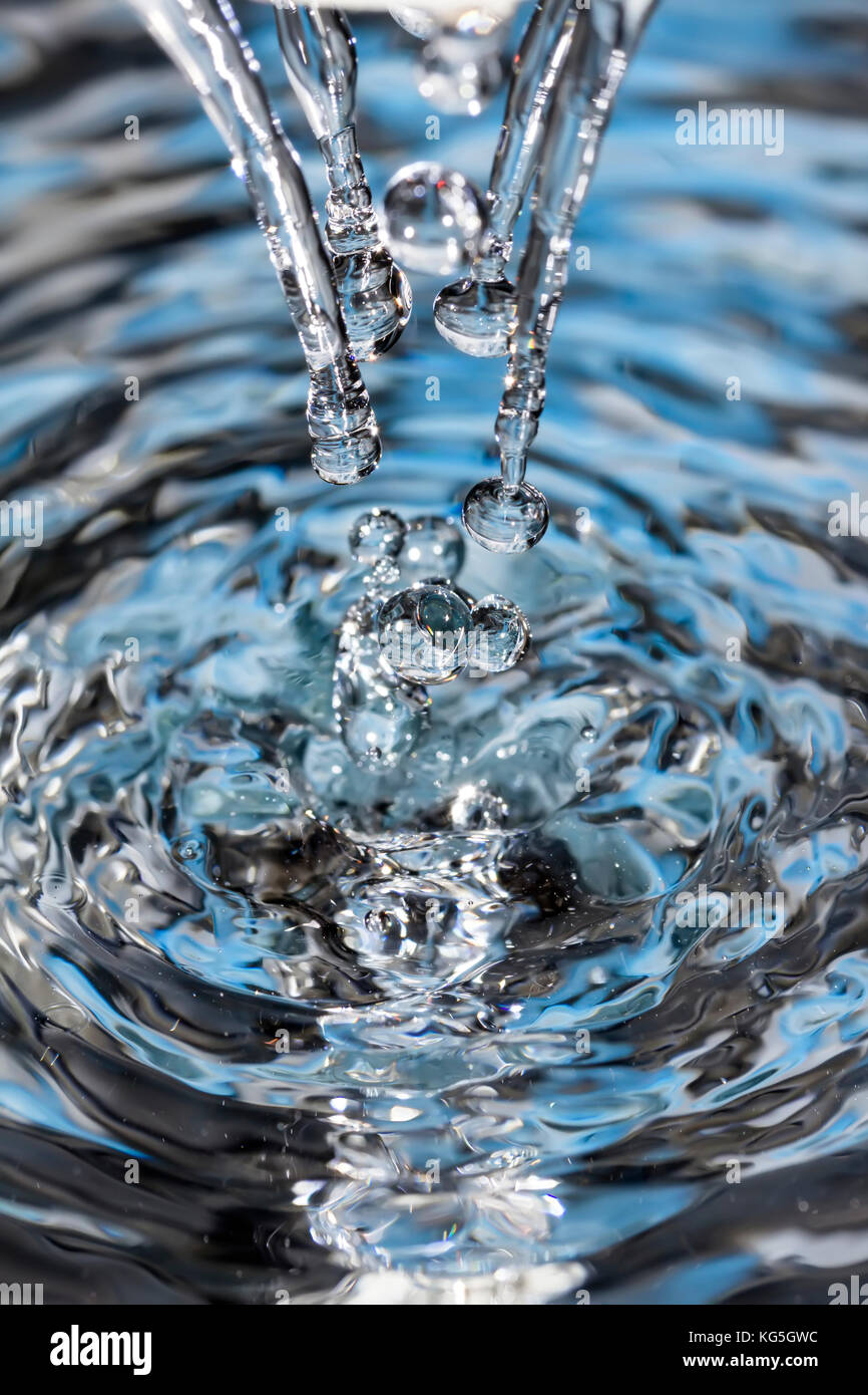 Splashed water drops. Fresh, blue water. Natural background Stock Photo ...