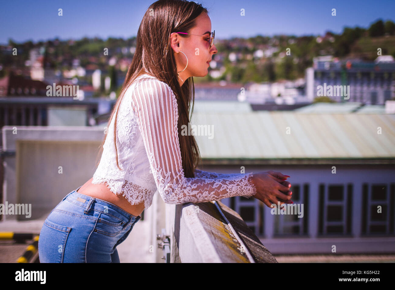 Young woman portrait half face hi-res stock photography and images - Alamy