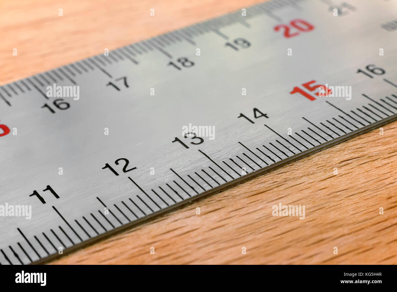 A fragment of metal measuring ruler with centimeter and millimeter ...