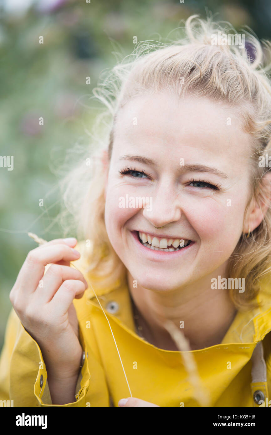 Woman smiling in nature hi-res stock photography and images - Alamy