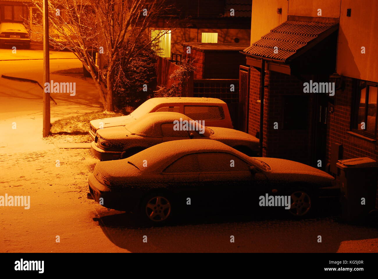Cars in snow at night Stock Photo - Alamy