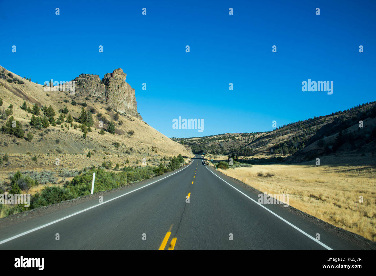 Road leading through the sheep rock unit in the John Day fossil beds ...