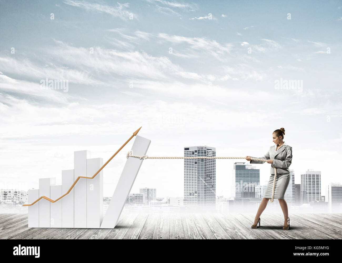 Young woman outdoors and growing graph presenting growth progress Stock ...