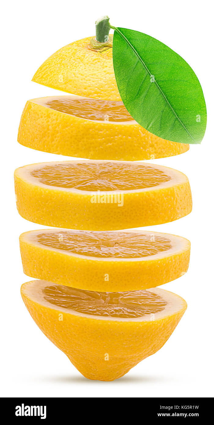 Ripe slices lemon with a leaf flying in the air isolated on white ...