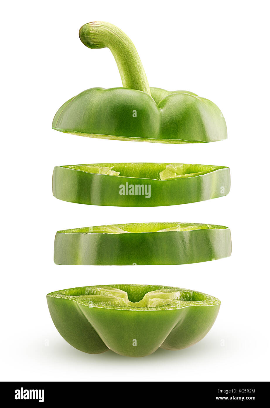 Slices green bell pepper flying in the air isolated on white background ...