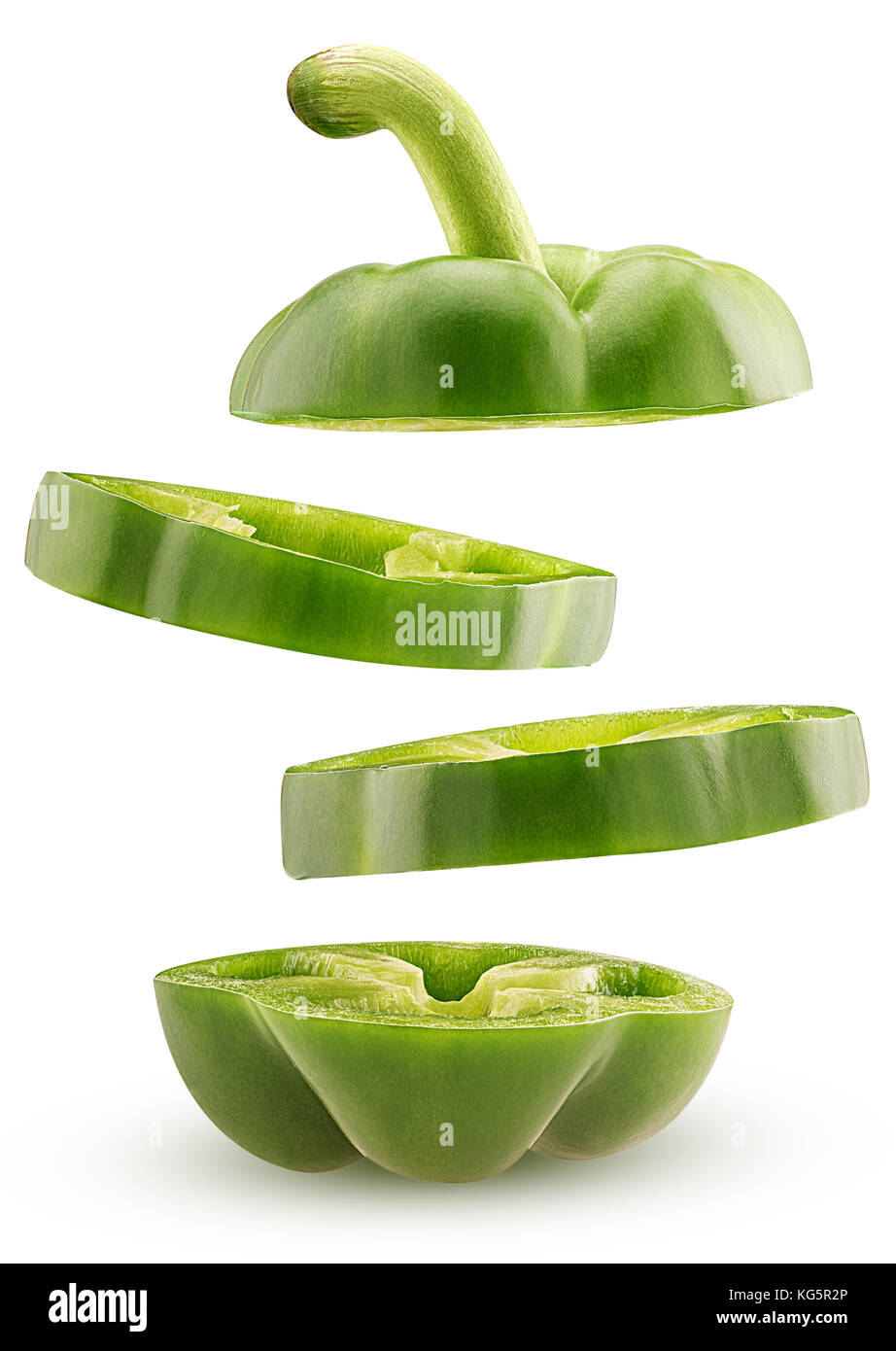 Slices green bell pepper flying in the air isolated on white background ...
