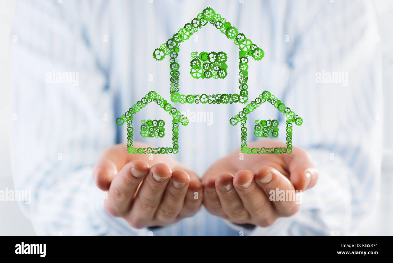 Hand of businessman showing house or home gear sign in palm Stock Photo ...