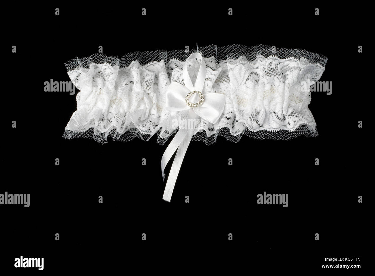 The garter for bride isolated on black background Stock Photo - Alamy