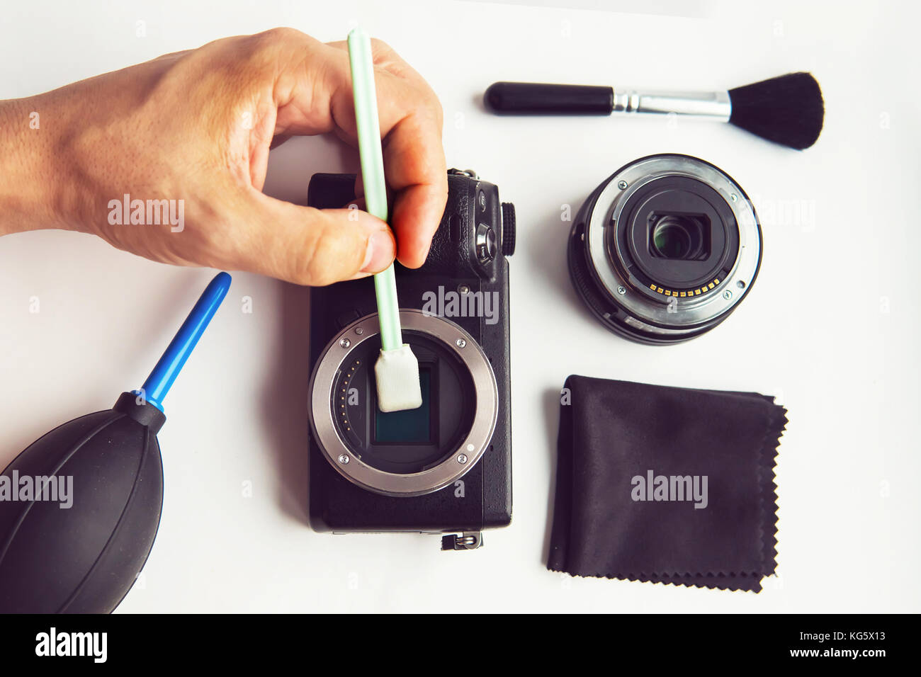 Mirrorless Sensor cleaning and Maintenance,Photographer hand cleaning ...