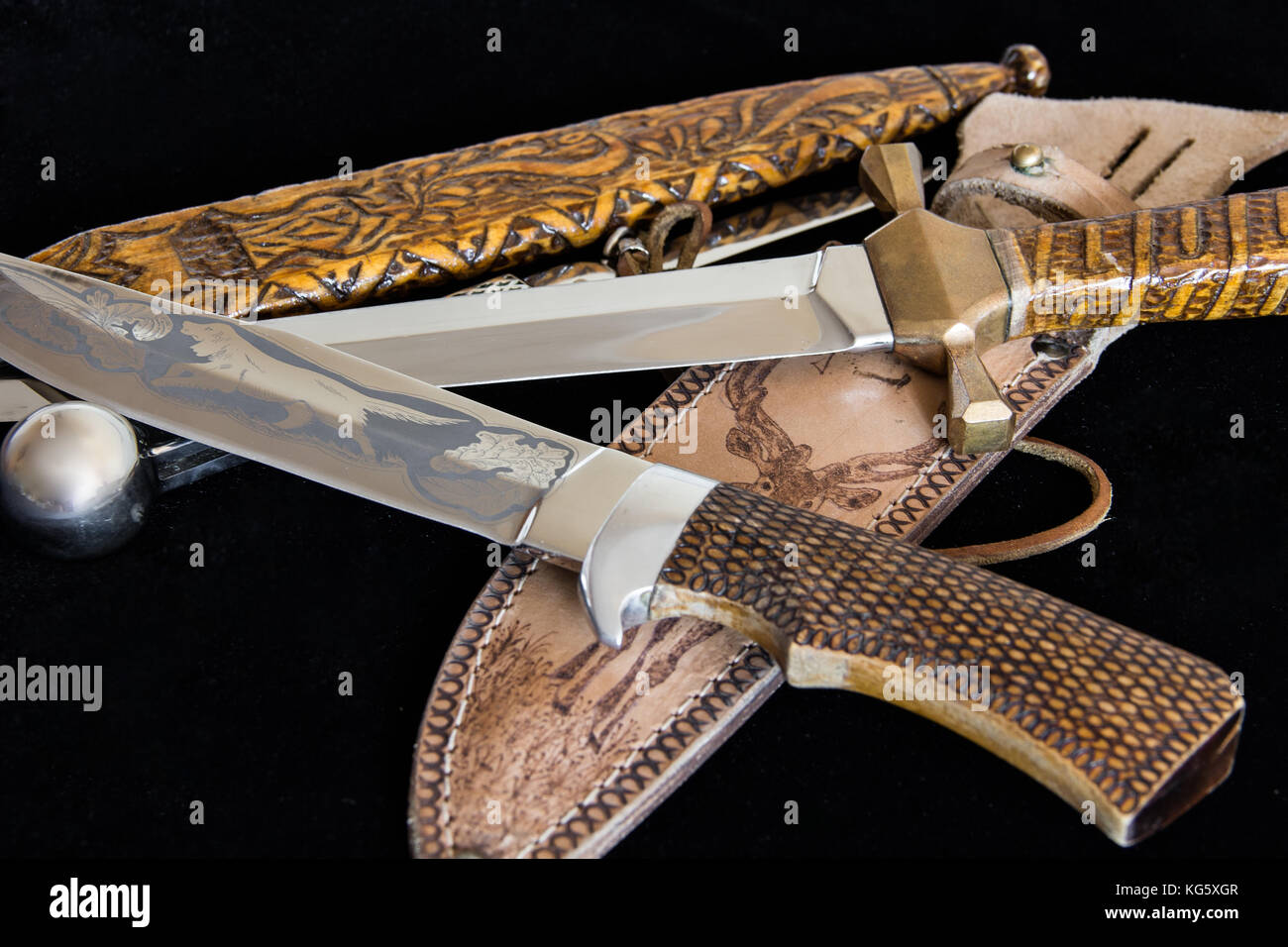 Photo of cold weapon on black background Stock Photo - Alamy