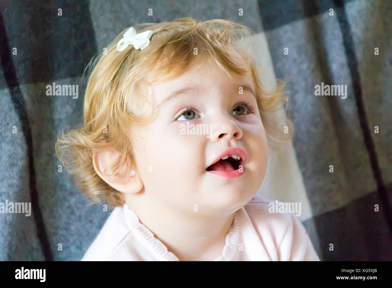 Image of beautiful cute Cute yawning infant girl Stock Photo - Alamy